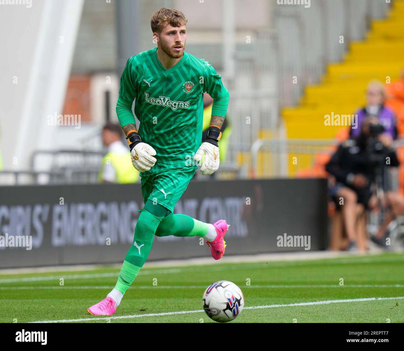 Daniel Grimshaw #32 of Blackpool looks to pass upfield during the Pre ...