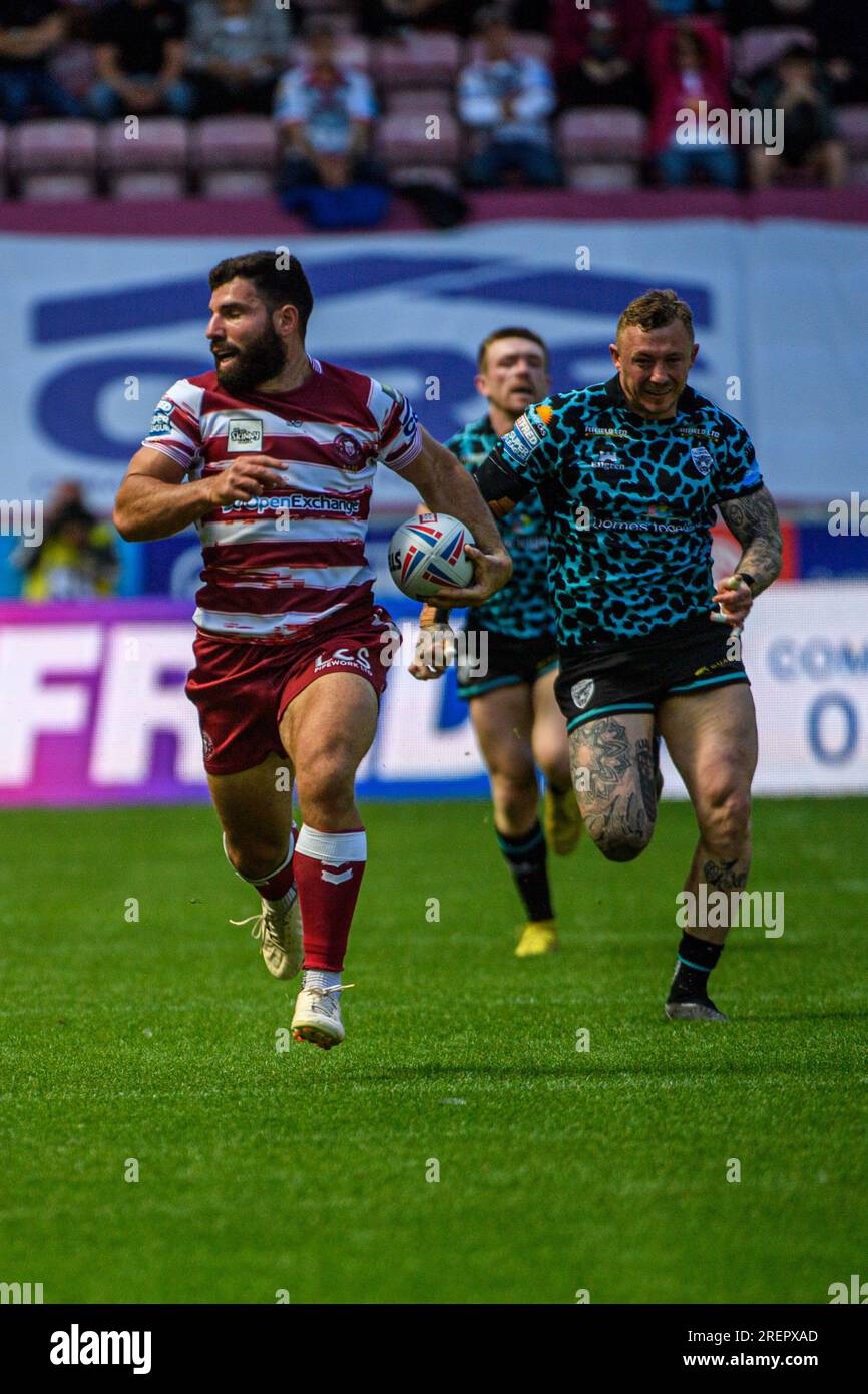 Wigan, UK. 29th July 2023. Warriors' Abbas Miski runs in for a try ...