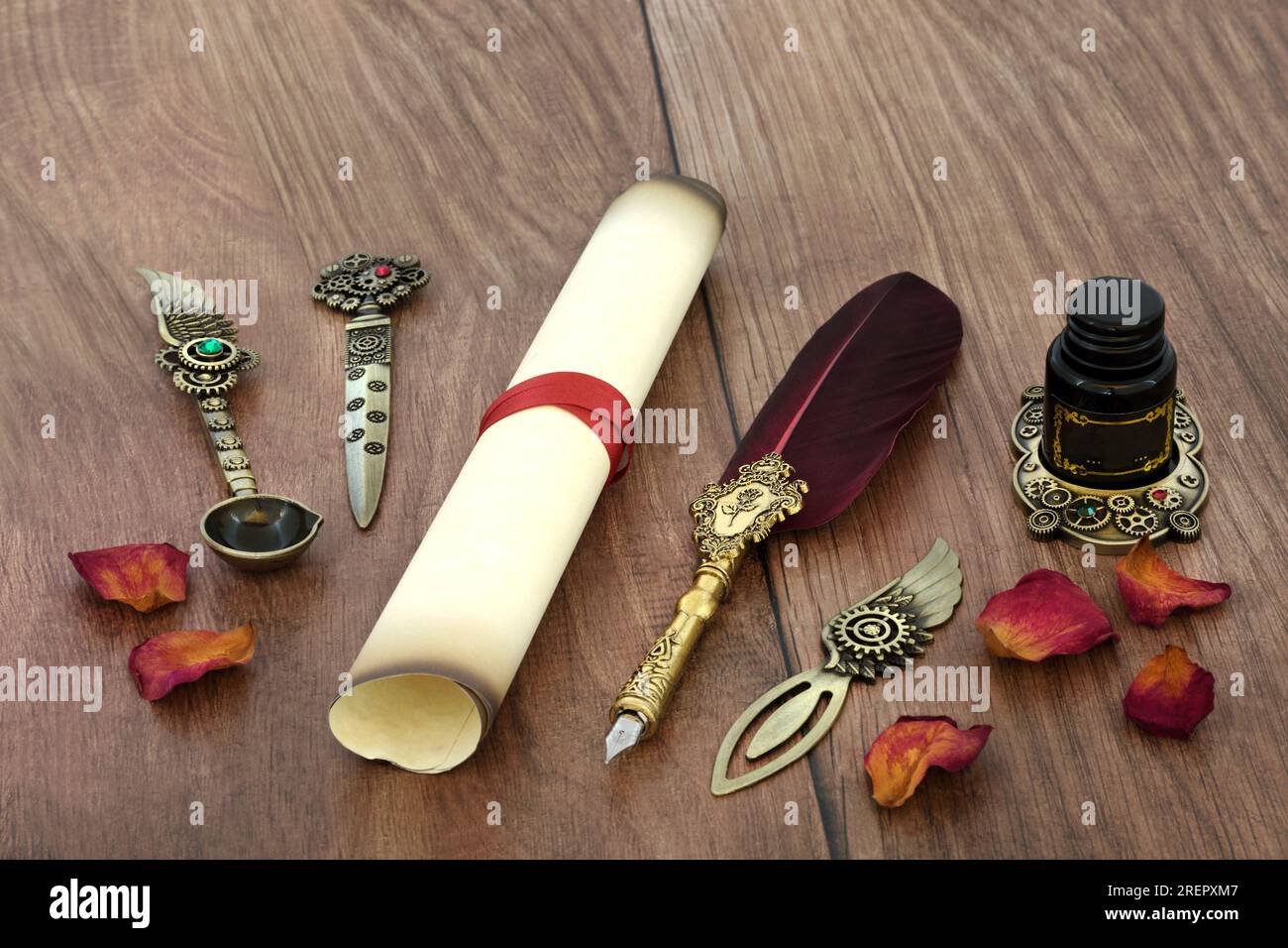 Parchment paper scroll with old feather quill pen, retro brass writing ...