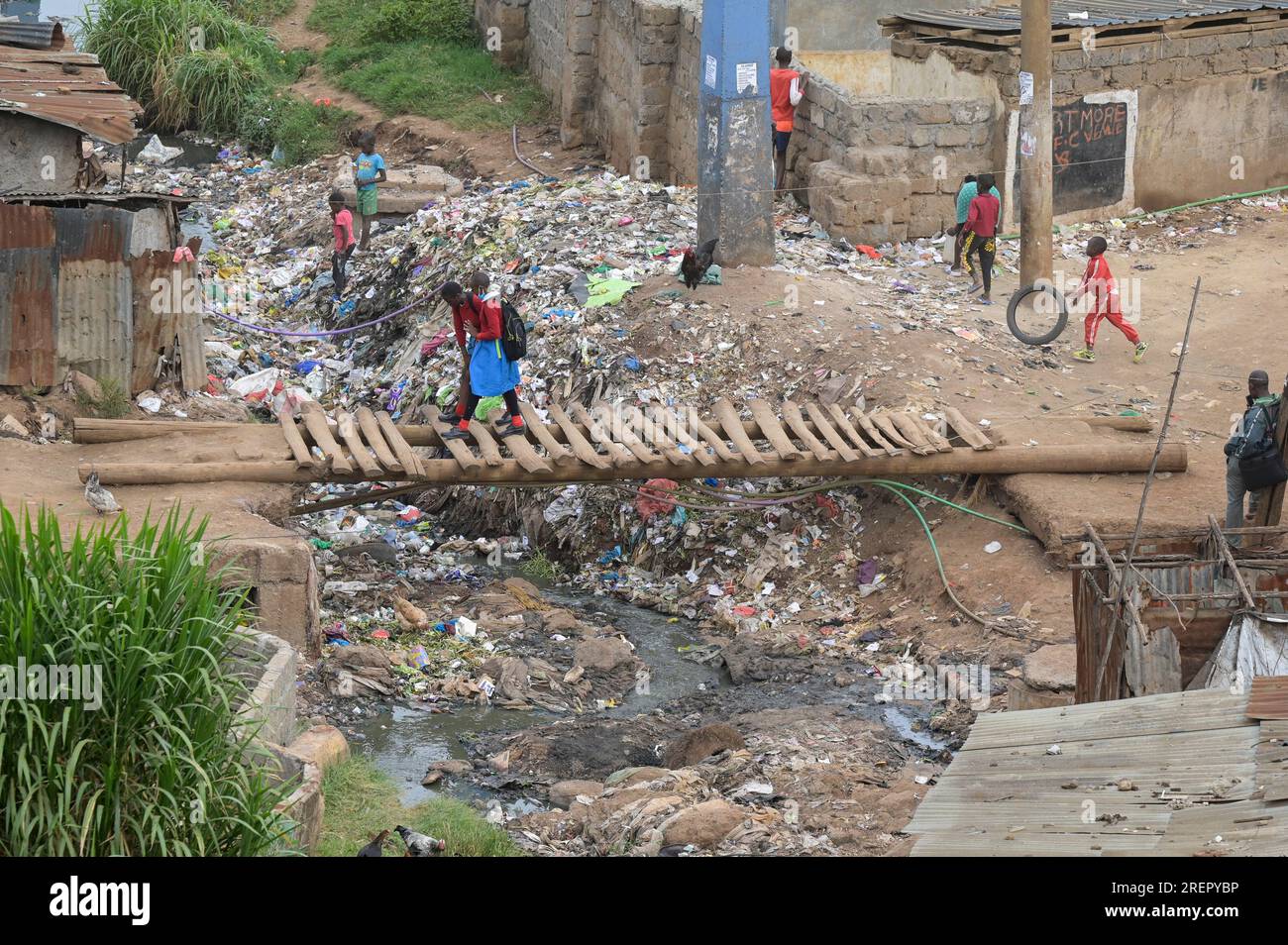 KENYA, Nairobi, Kibera slum, sewage canal / KENIA, Nairobi, Slum Kibera ...