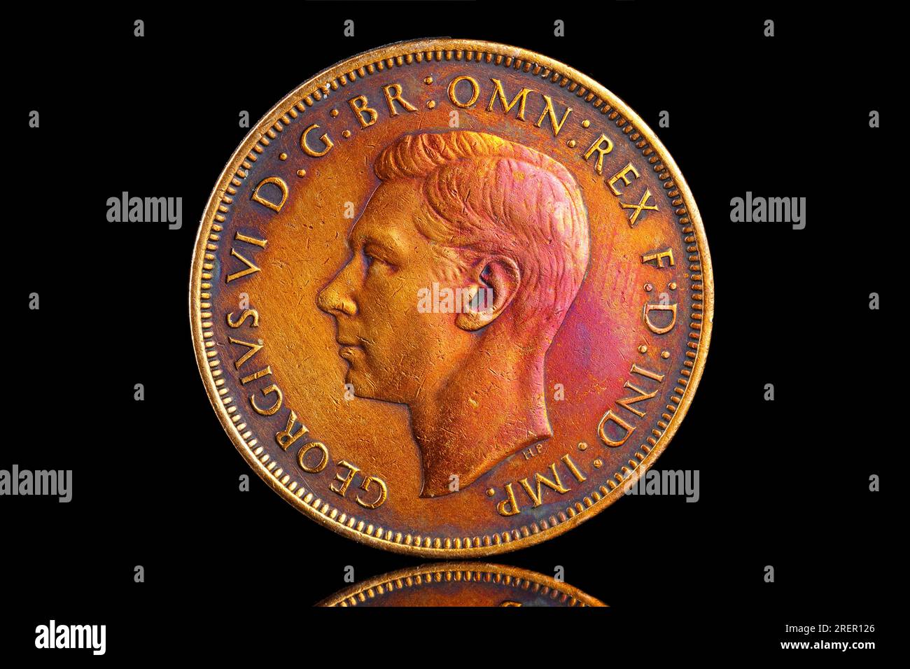 1948 Britannia One Penny with rainbow toning colours. The obverse ...