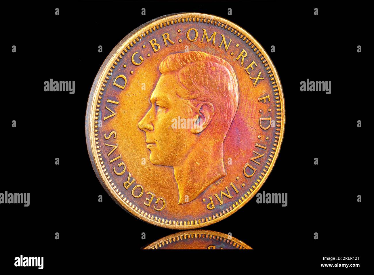 1948 Britannia One Penny with rainbow toning colours. The obverse ...