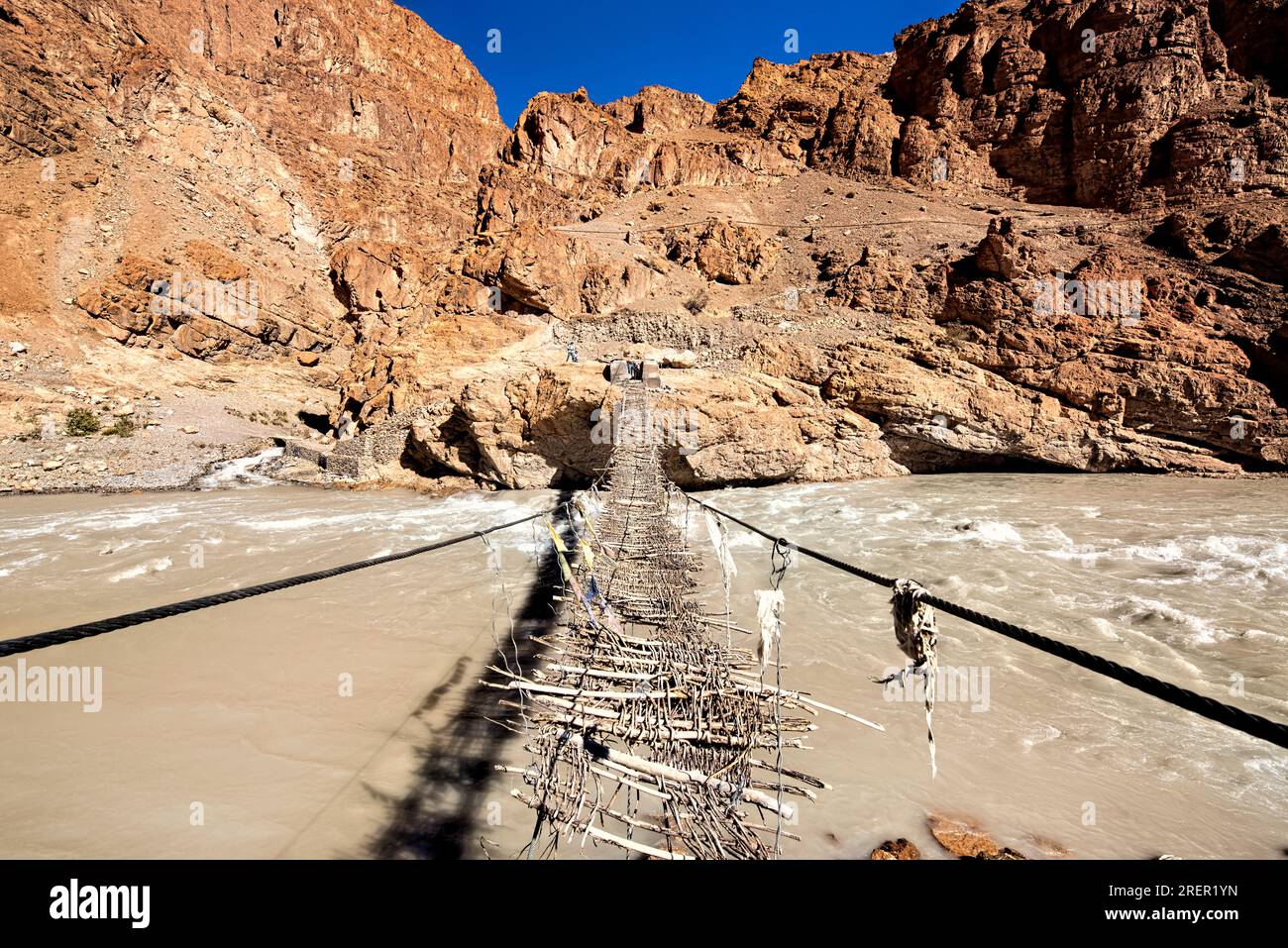 Traditional bridge across the Tsarab Chu River, Phugtal, (Phuktal ...