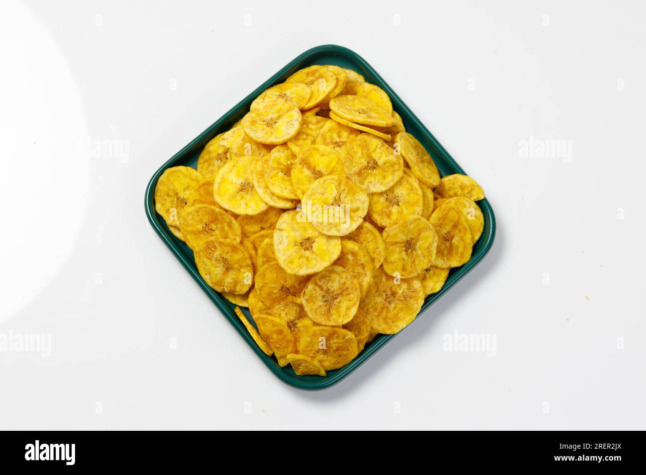 Kerala chips or Banana chips, cult snack item of Kerala, arranged in a ...