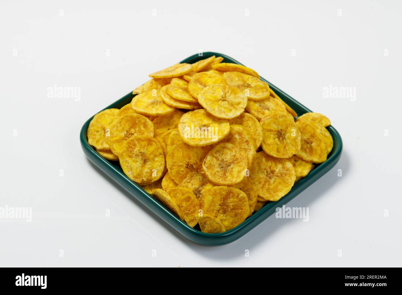 Kerala chips or Banana chips, cult snack item of Kerala, arranged in a ...