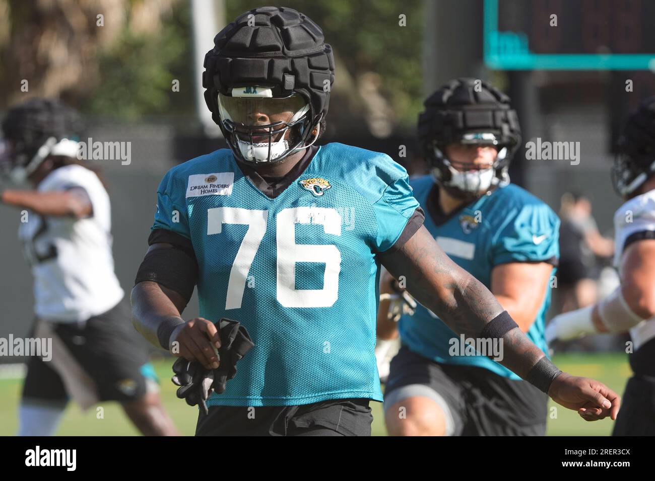 Jacksonville Jaguars offensive tackle Anton Harrison (76) warms up ...