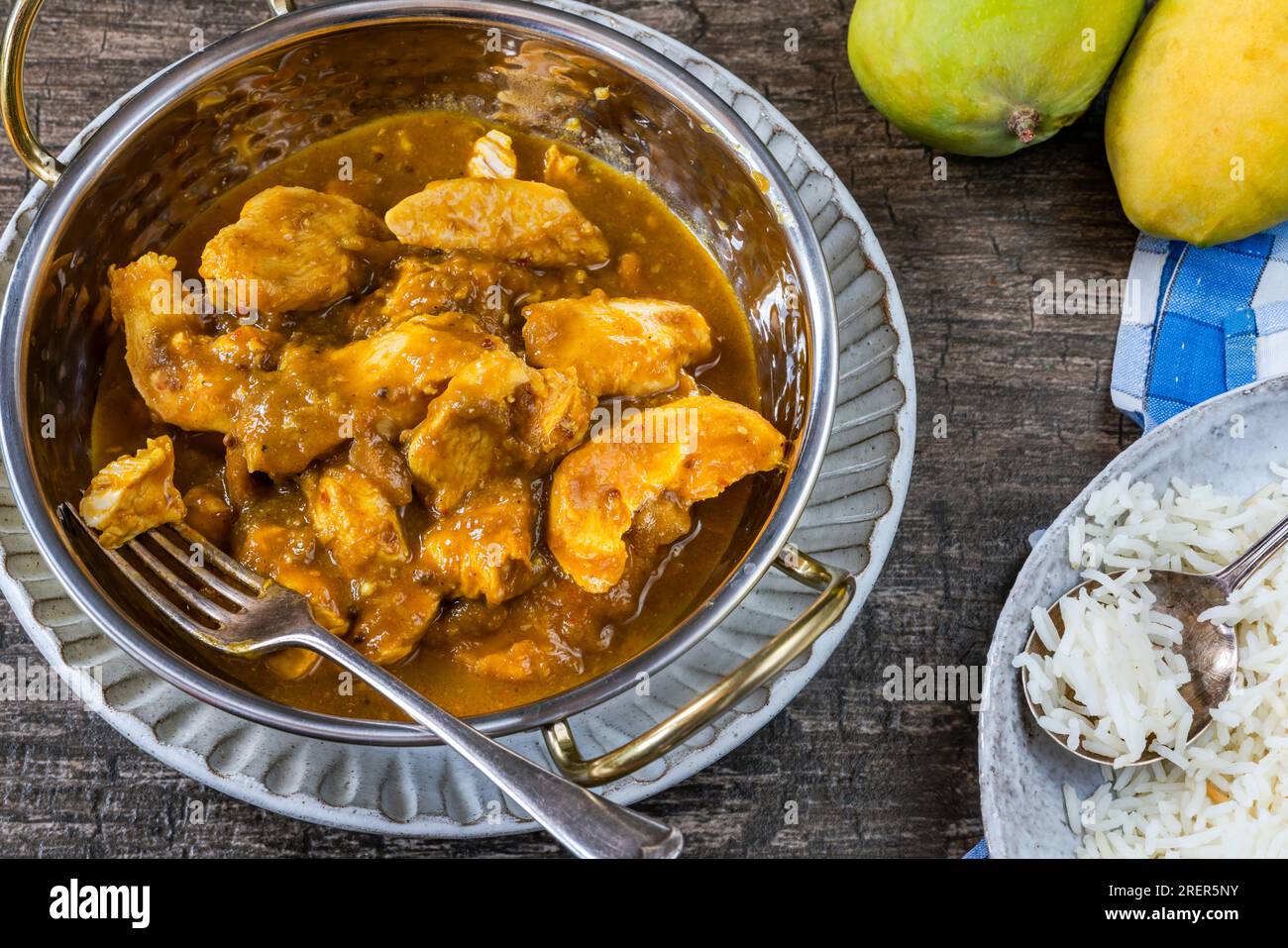Mango and chicken curry with rice Stock Photo - Alamy