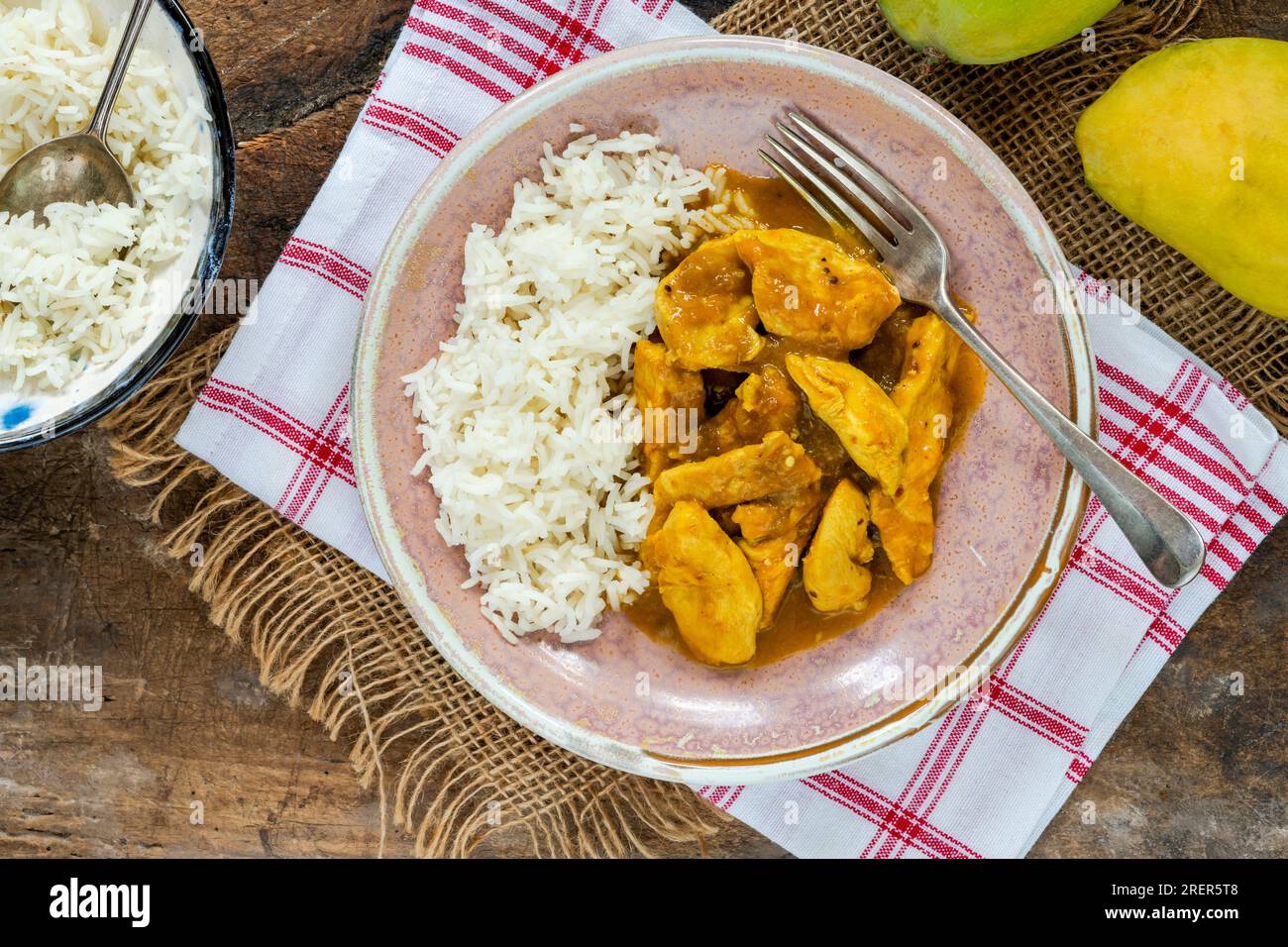 Mango and chicken curry with rice Stock Photo - Alamy