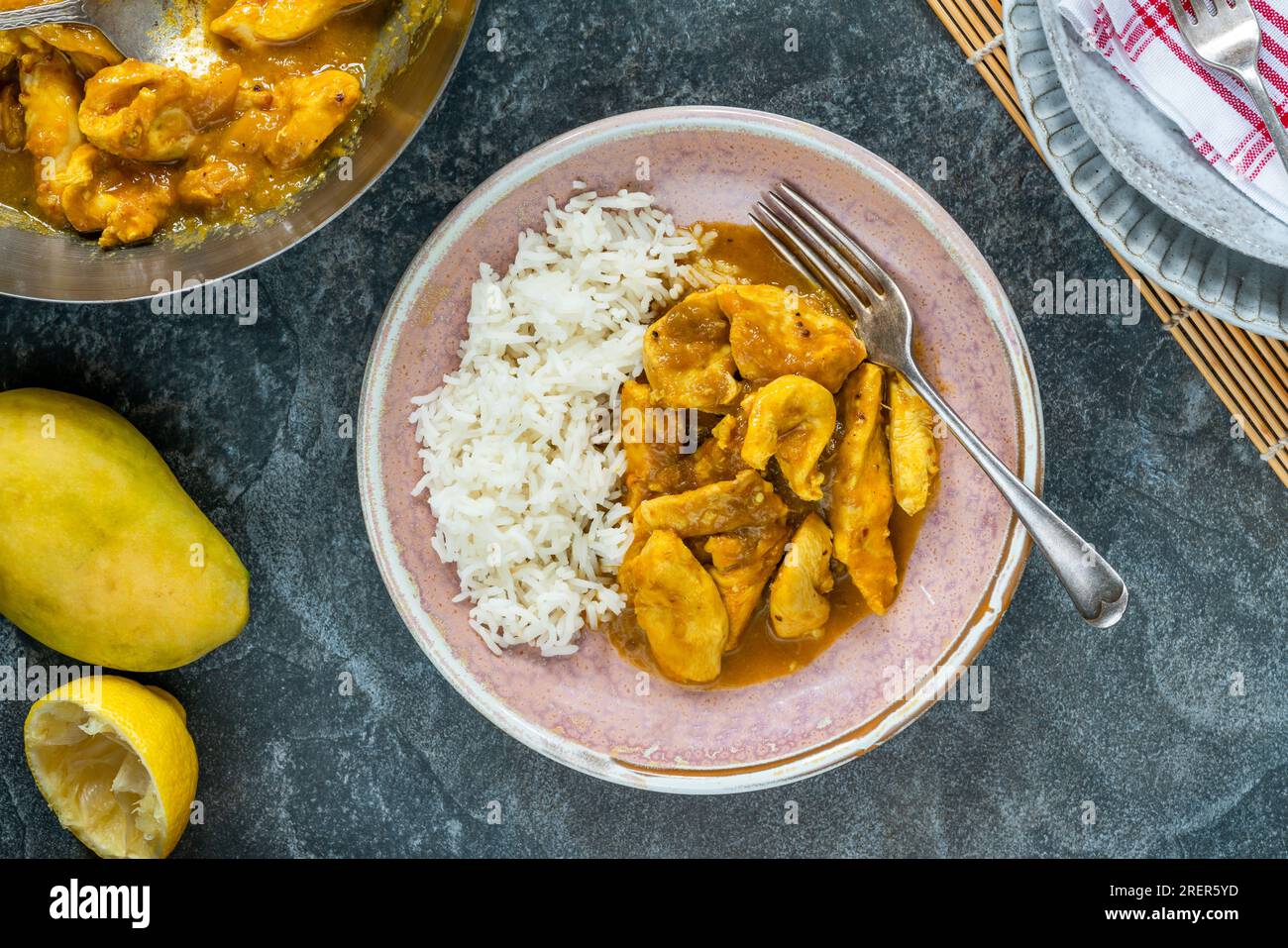 Mango and chicken curry with rice Stock Photo - Alamy