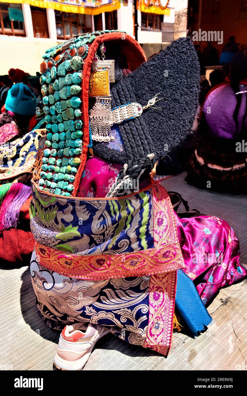 Ladakhi women in traditional clothing (perak headdress) at a high lama ...