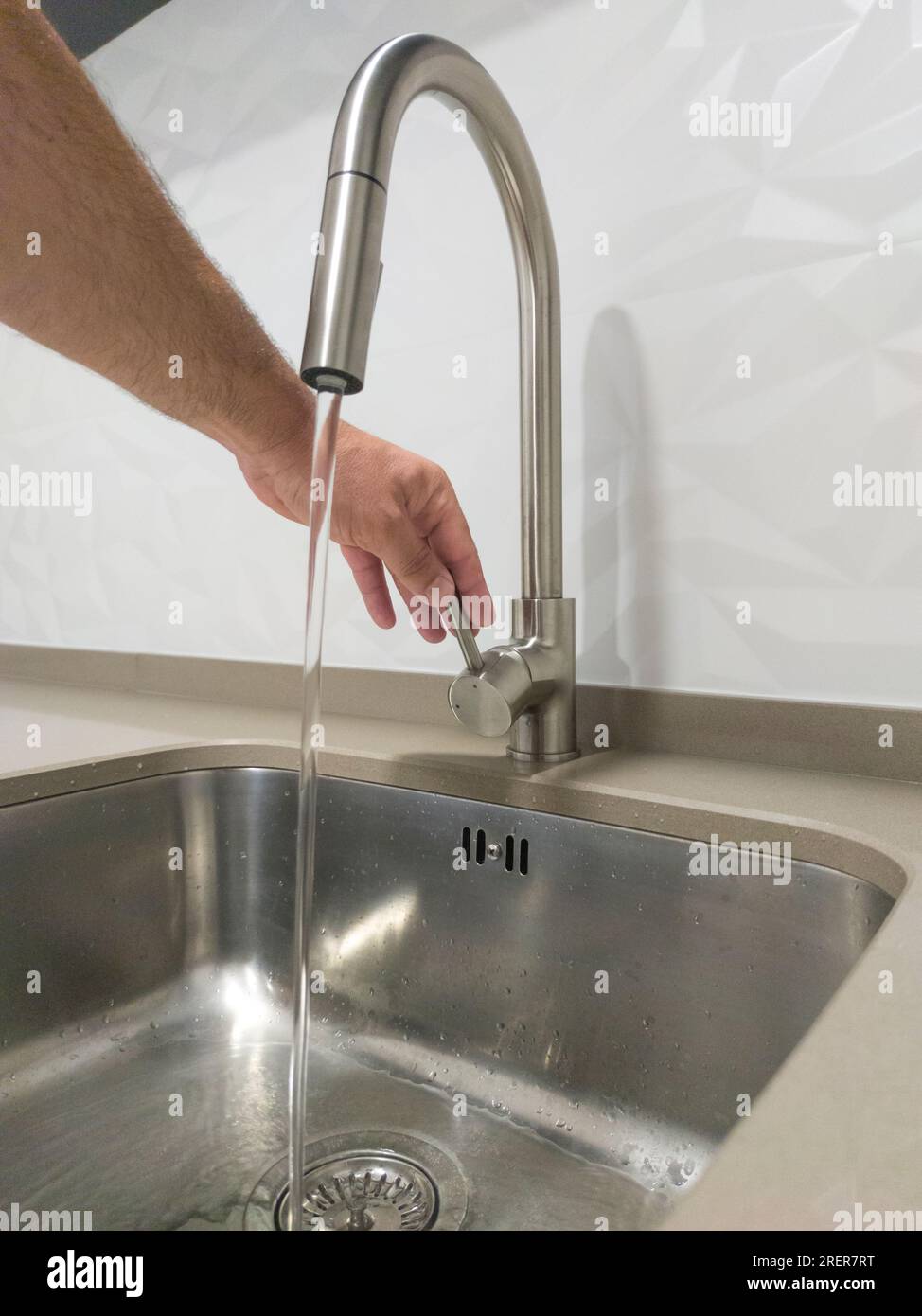 Through a tap hi-res stock photography and images - Alamy