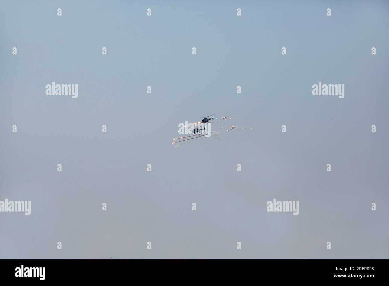 military helicopters evading air defense. A helicopter releases heat ...