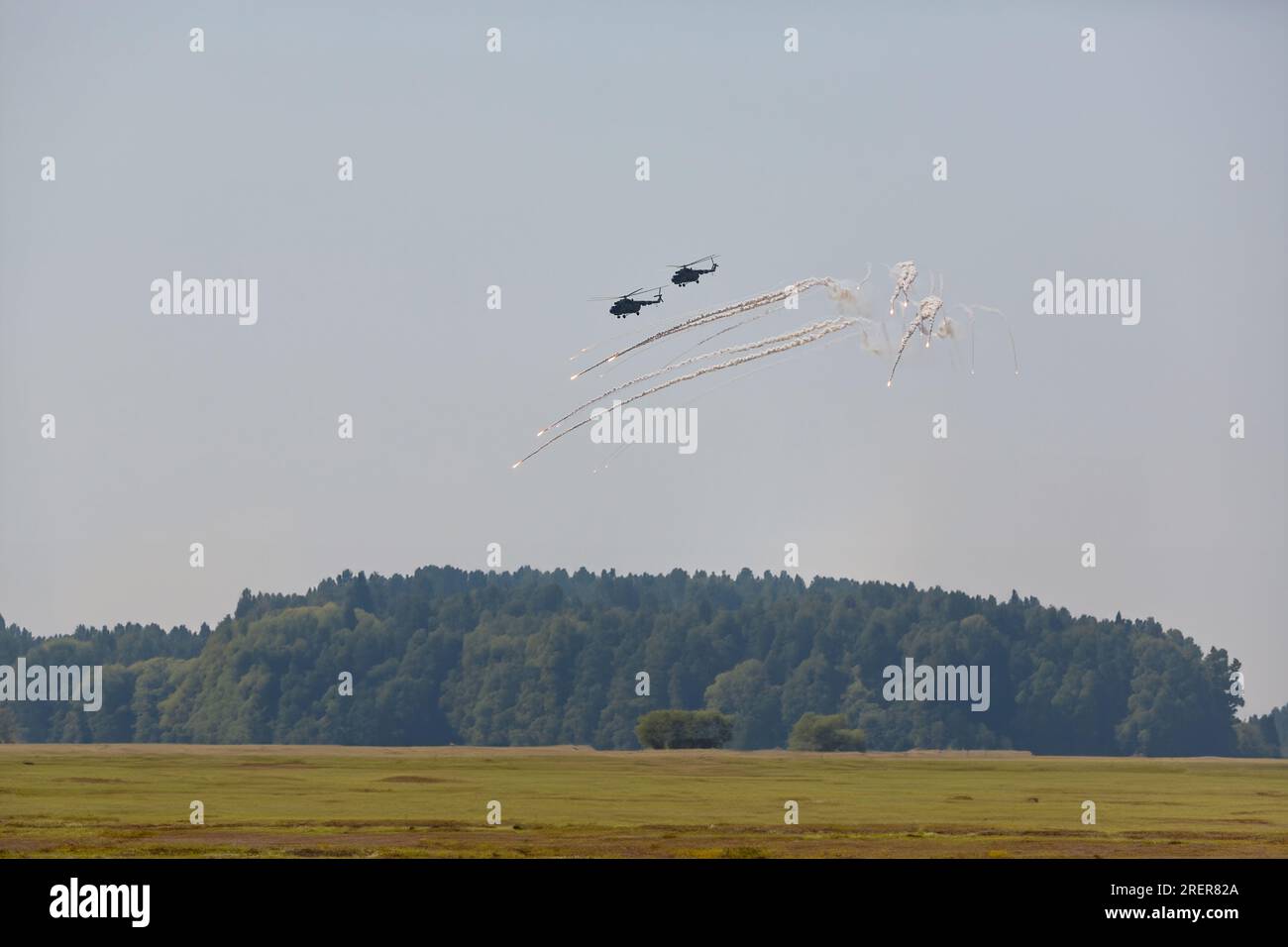 military helicopters evading air defense. A helicopter releases heat ...