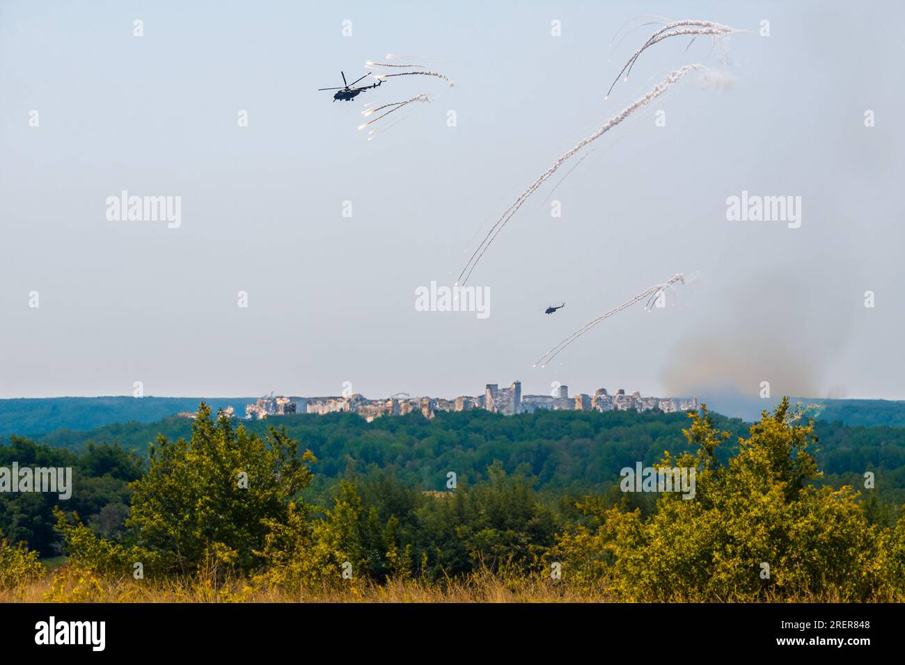military helicopters evading air defense. A helicopter releases heat ...