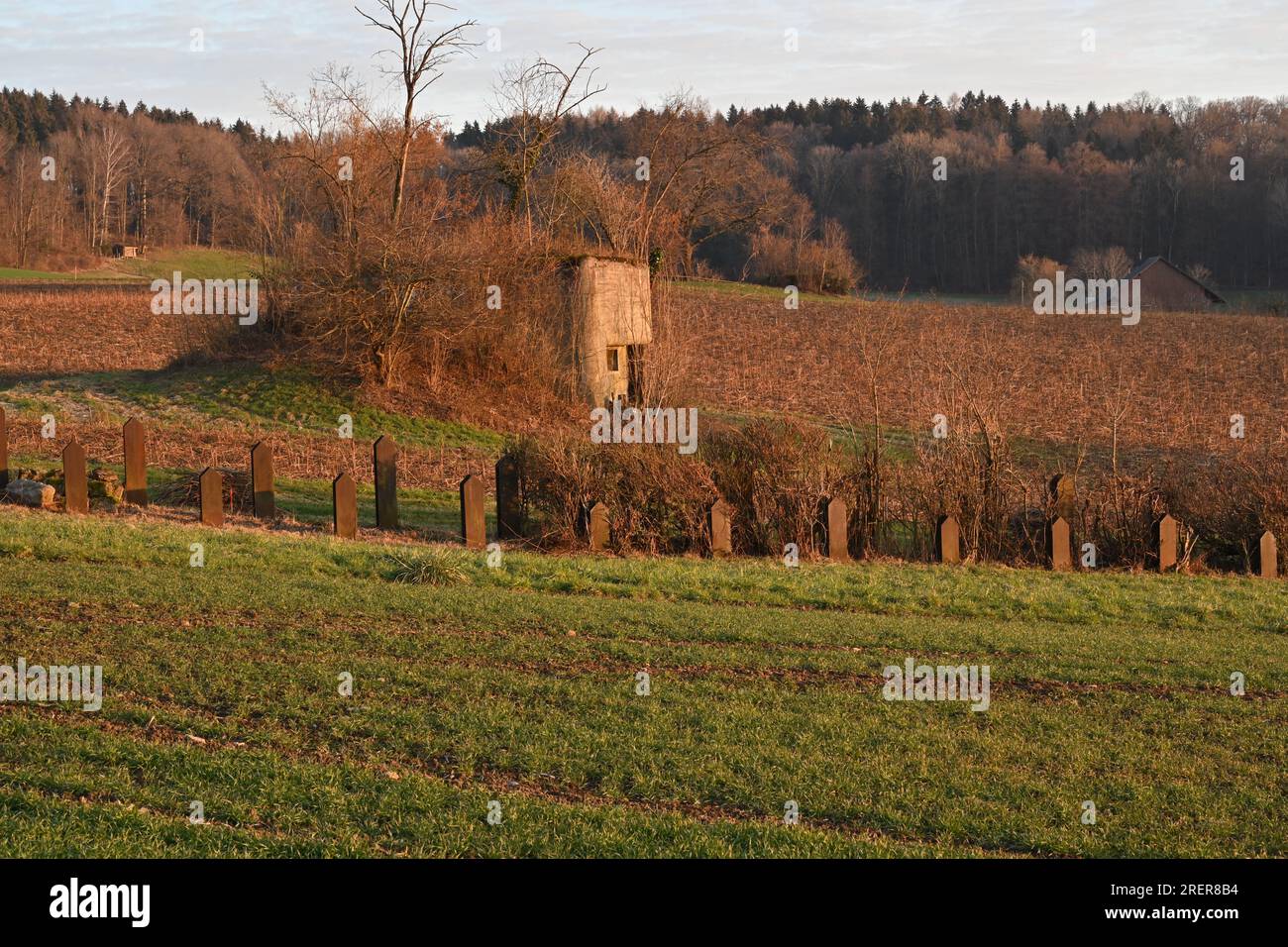 Rail anti tank obstacles and concrete bunker as military fortified ...