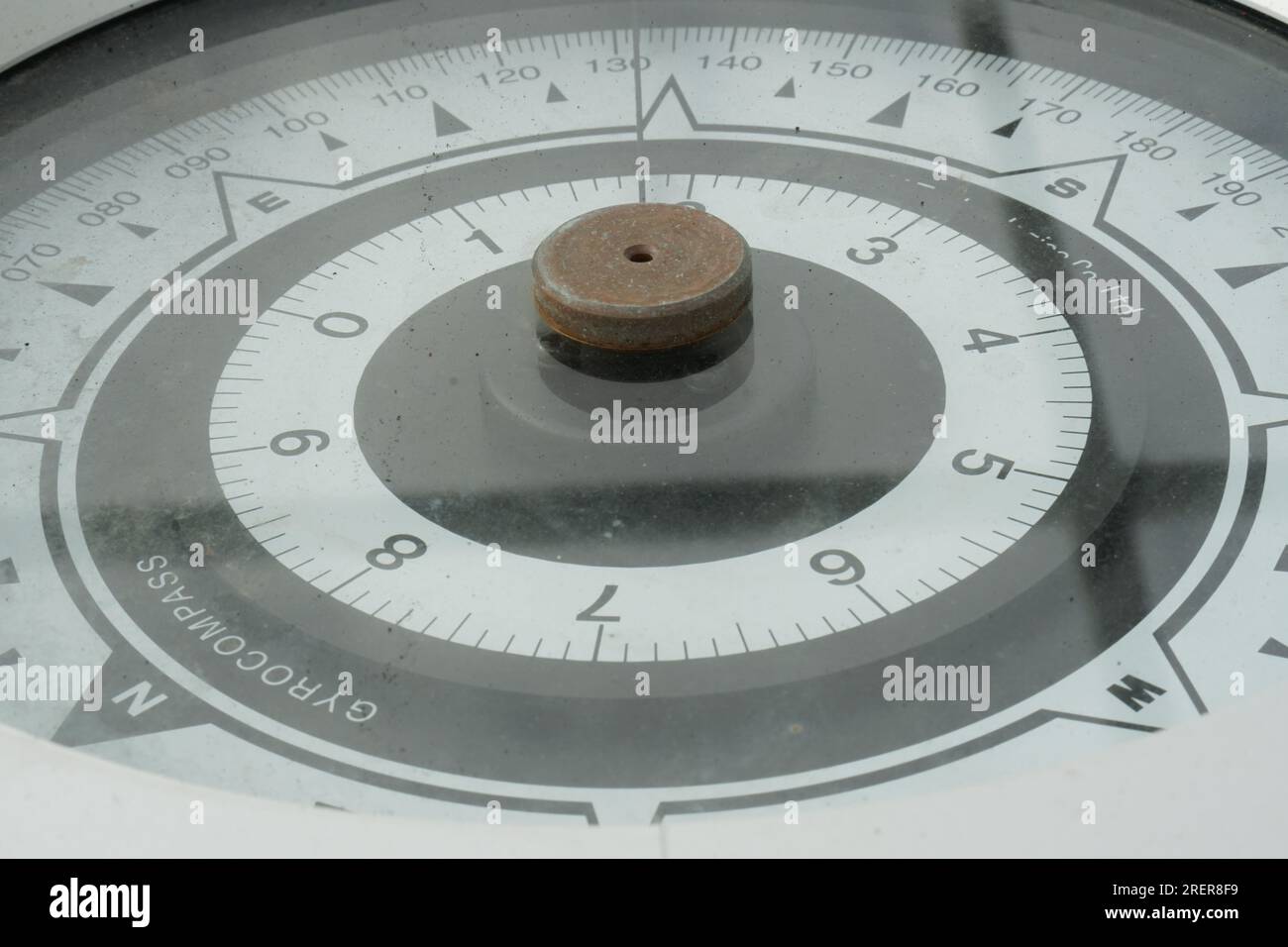 A gyrocompass card or compass rose of repeater in detail view installed ...