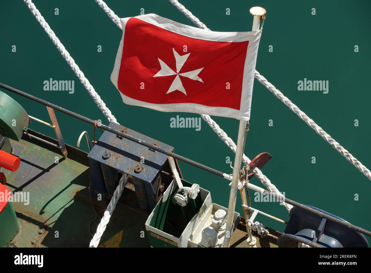 Malta flag, red banner with white cross, flying in aft part oft ...