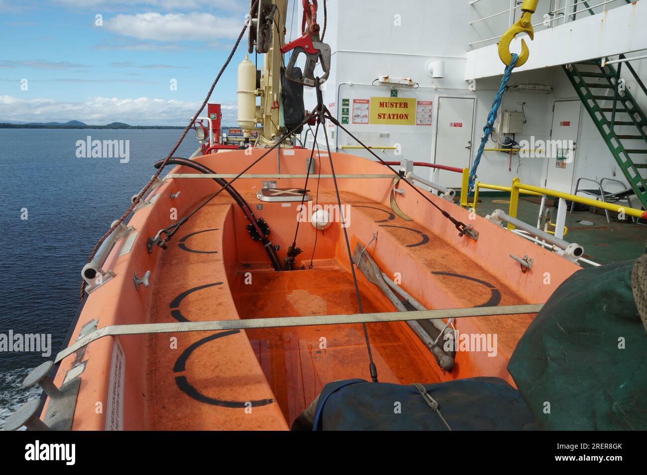 Orange rescue boat with outboard engine built from glass reinforced ...