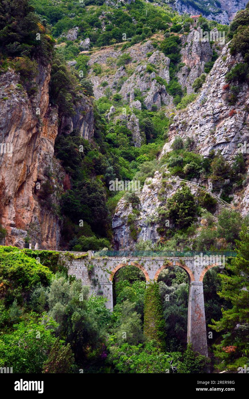 Picturesque bridge on the Amalfi coast road showing the steep, rugged ...