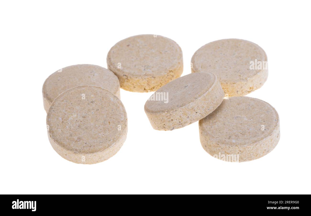 Pills round isolated on white background Stock Photo - Alamy