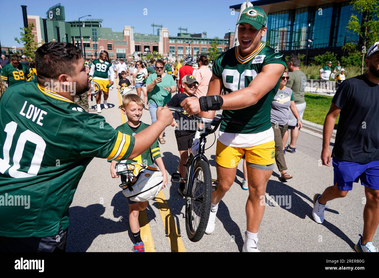 Green Bay Packers' Lukas Van Ness a bike to NFL football training camp ...