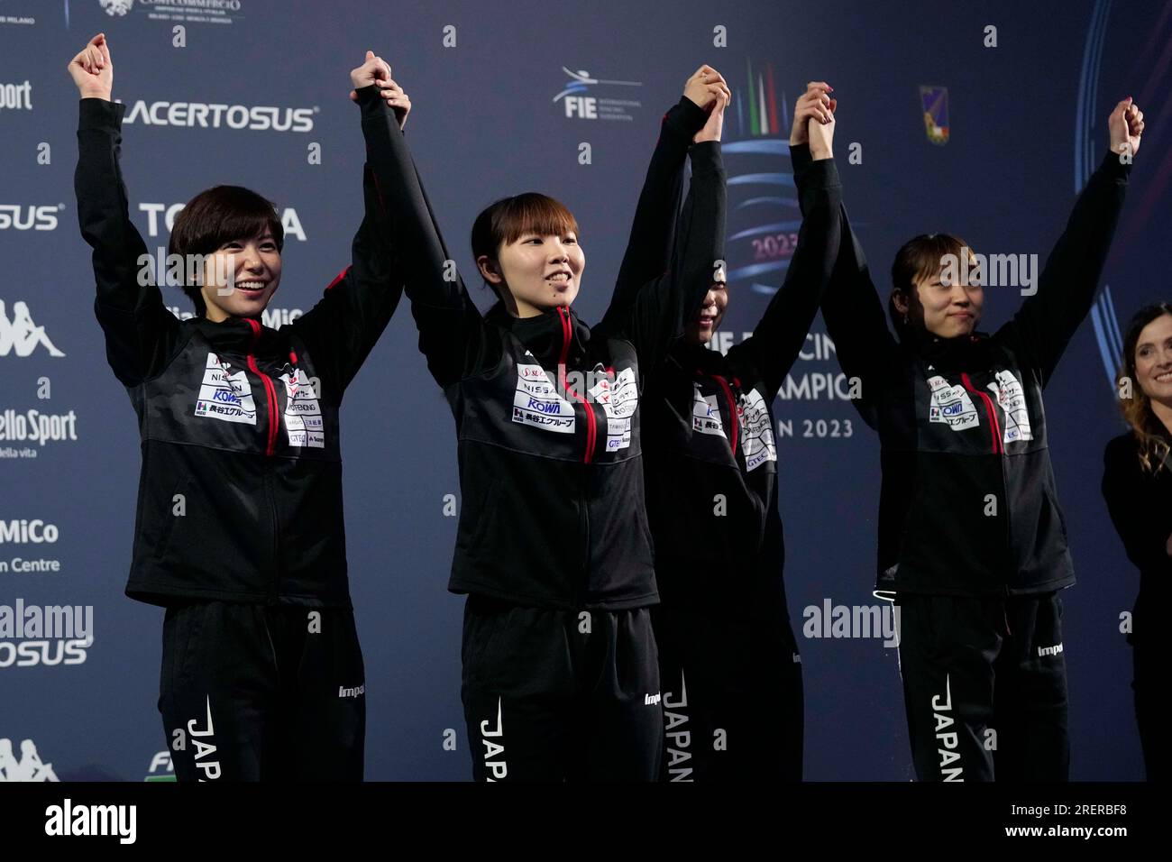 Japan's team celebrate on the podium their bronze medal in the women's ...