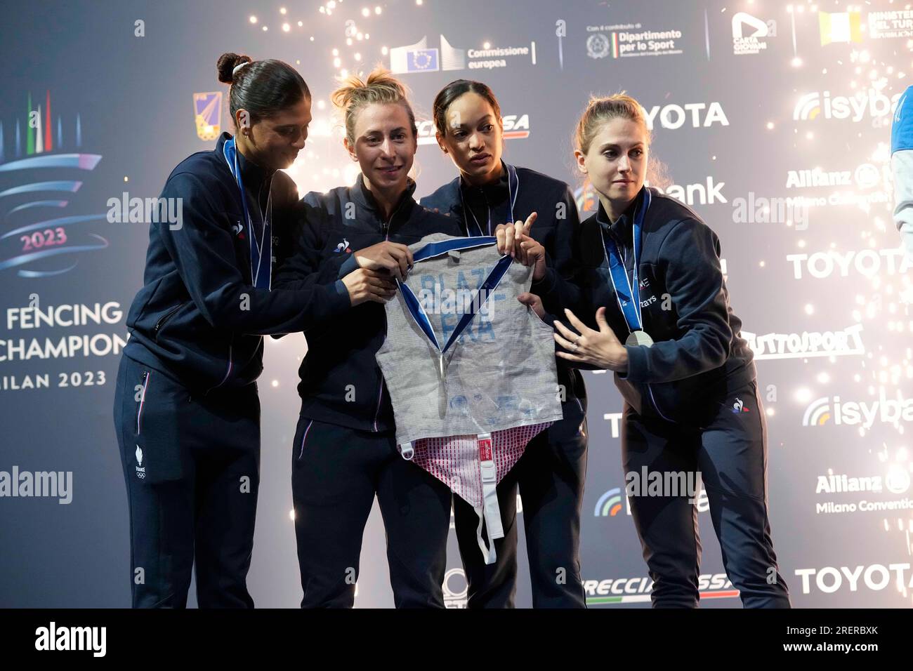 France team celebrate on the podium their silver medal in the women's ...