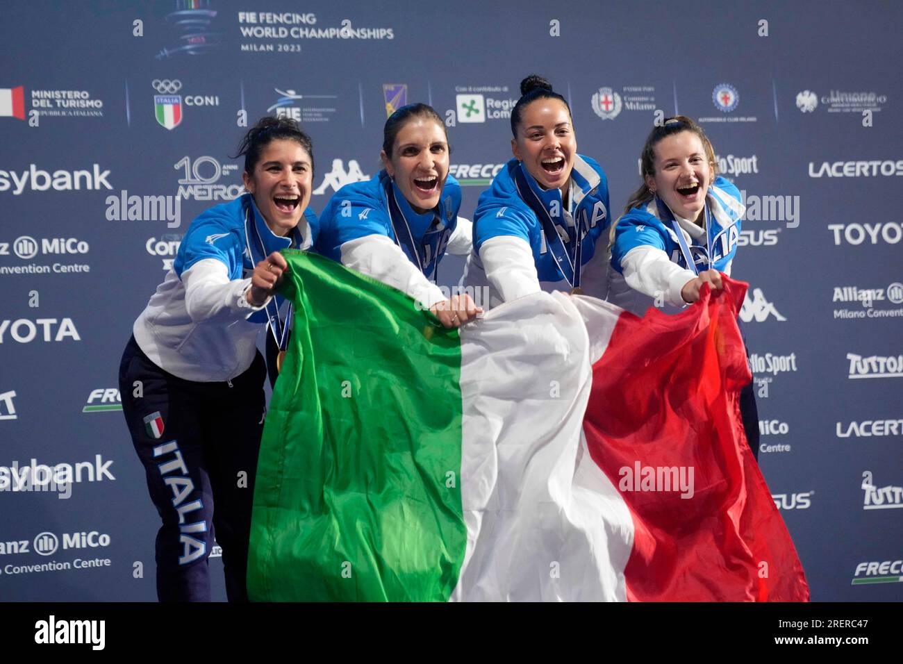 Italy's team celebrate on the podium their gold medal in the women's ...