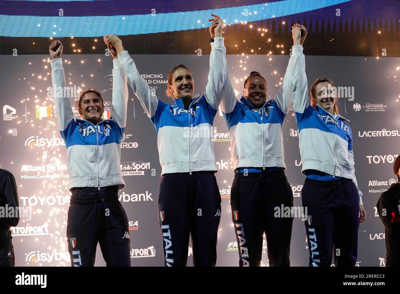 Italy's team celebrate on the podium their gold medal in the women's ...