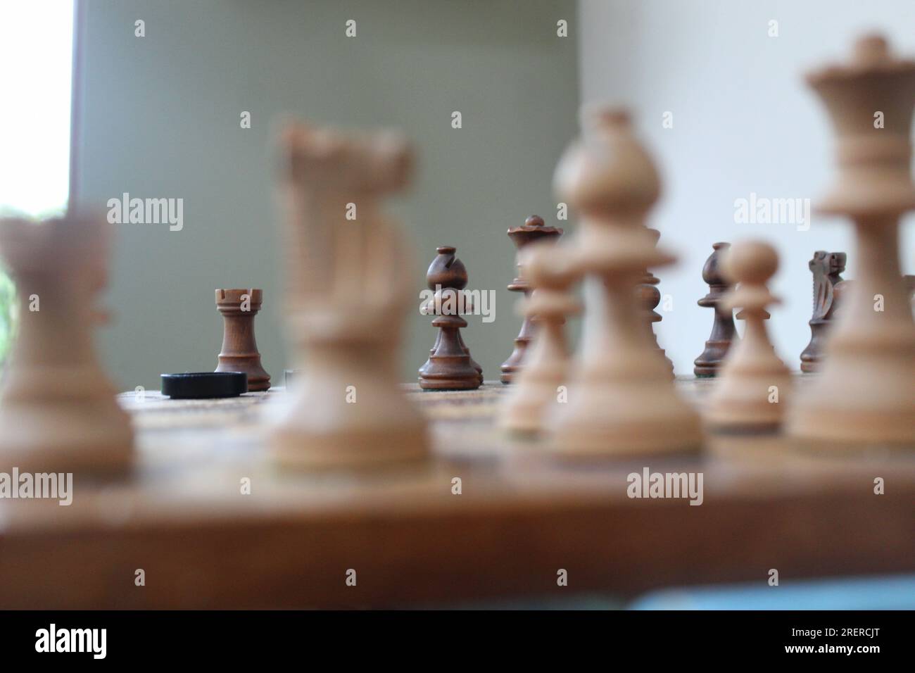 A close up photo of chess pieces on a chess set Stock Photo - Alamy