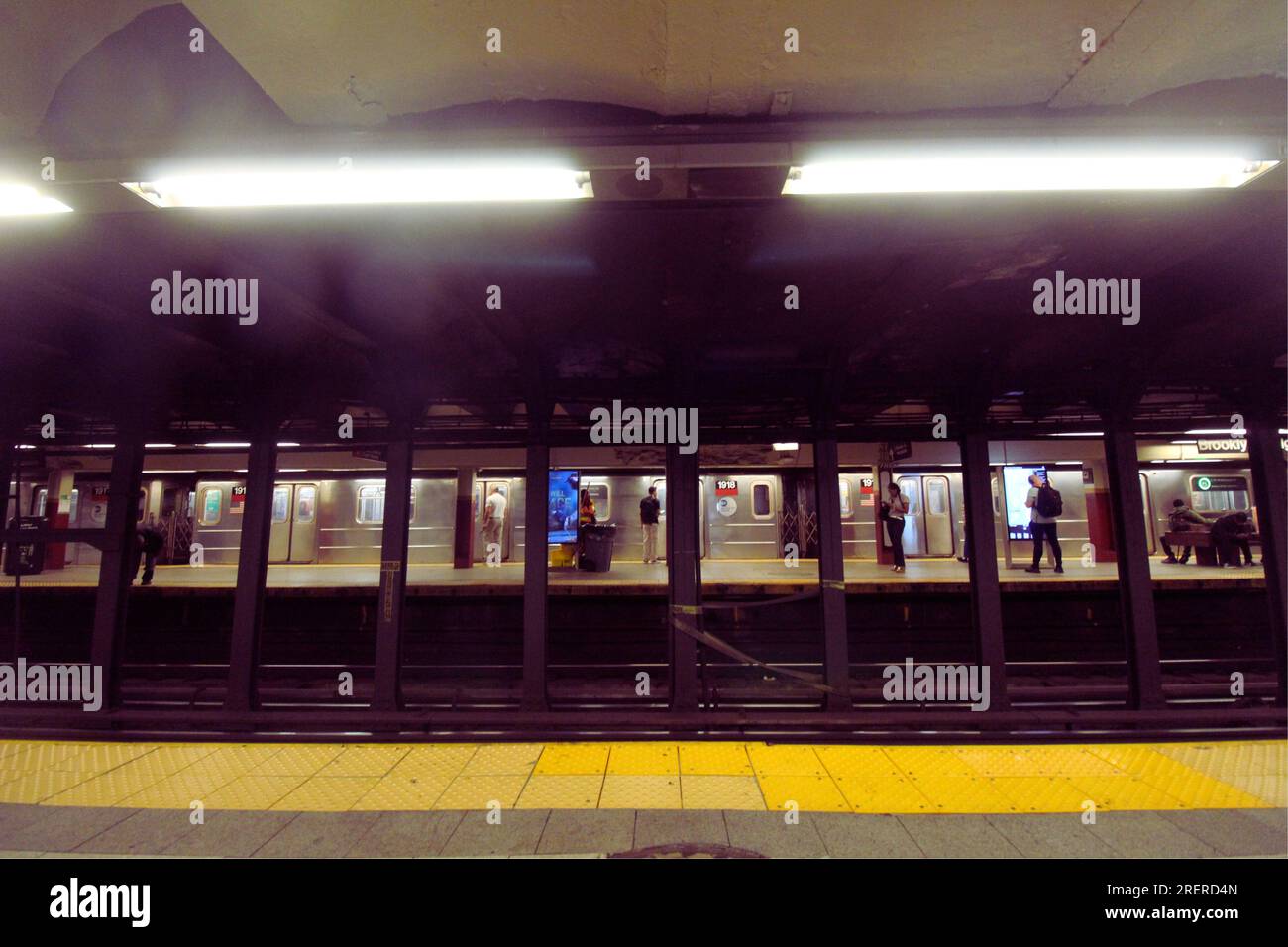 Photo of People Boarding New York Subway at Platform Stock Photo - Alamy