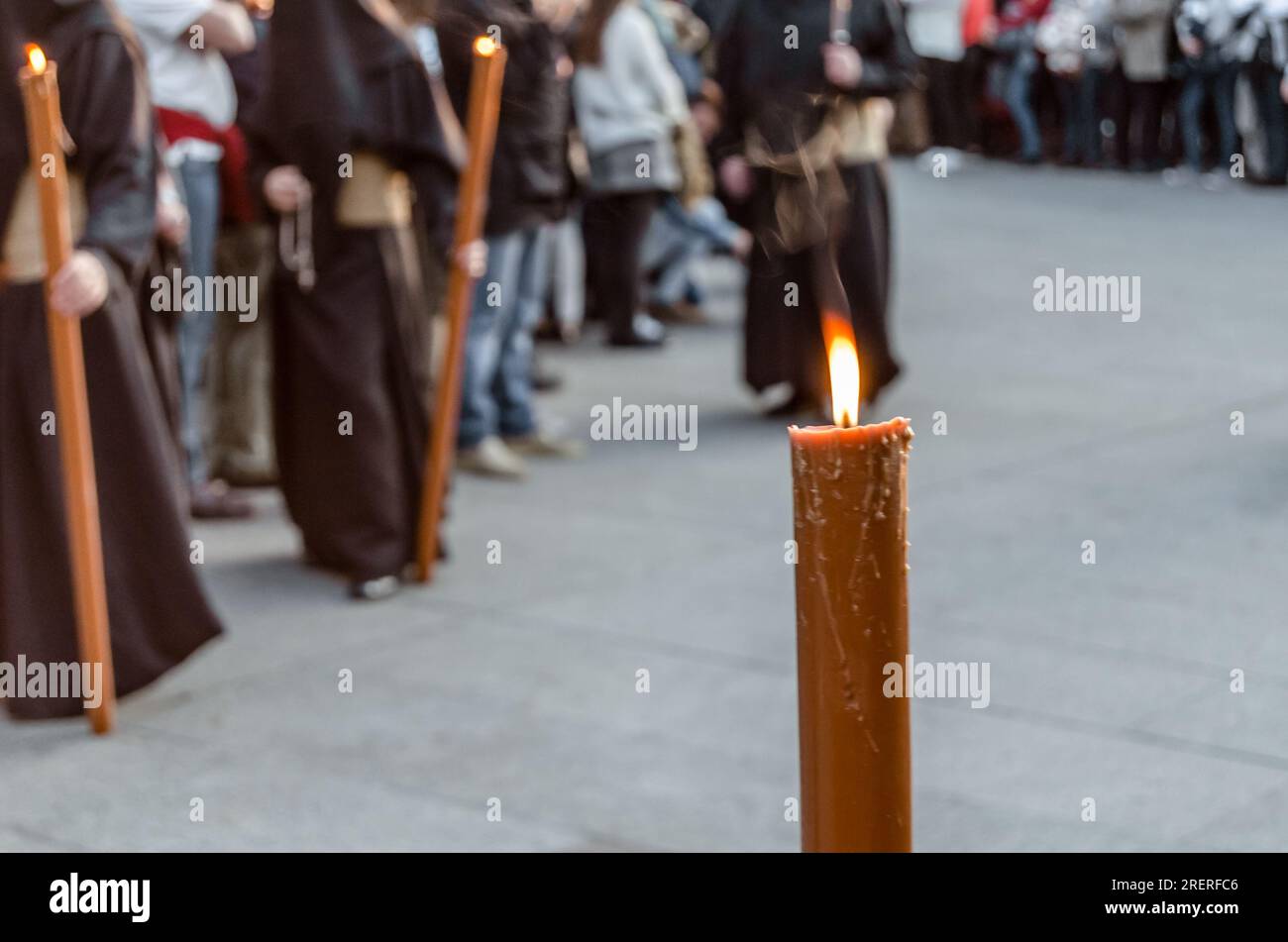 Candle lit during a traditional Holy Week procession in Spain Stock ...
