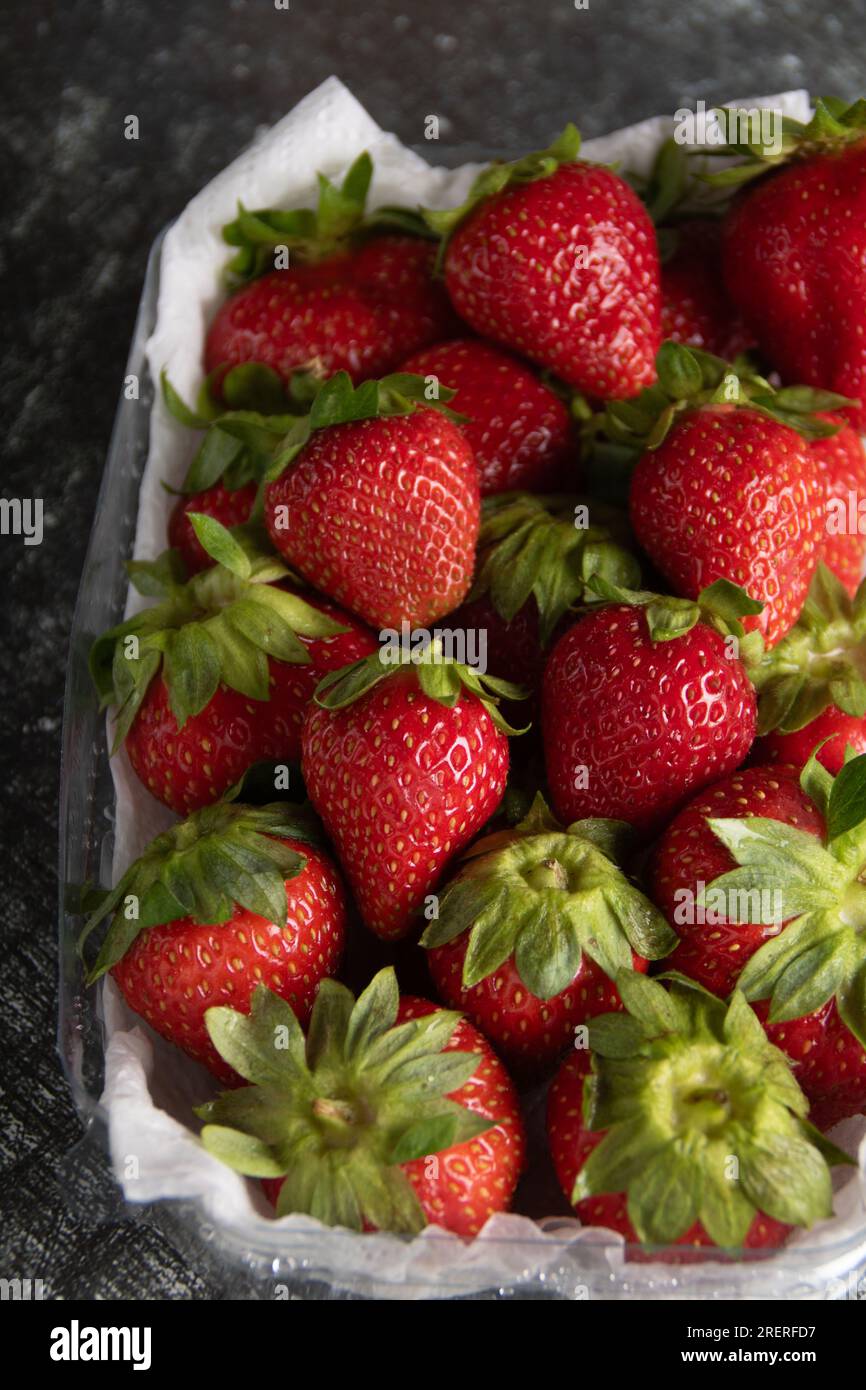Strawberries a plastic box hi-res stock photography and images - Alamy
