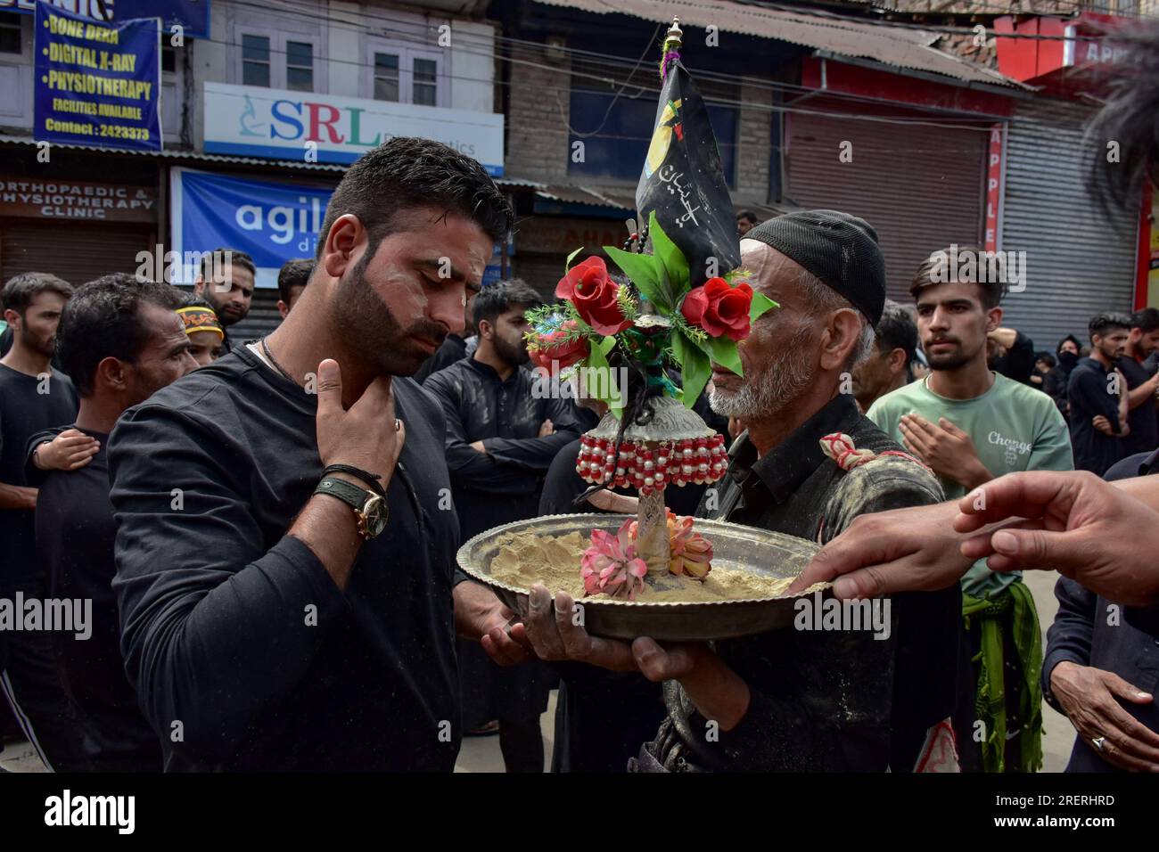 Srinagar, India. 29th July, 2023. Kashmiri Shiite Muslims perform rituals during a religious ...