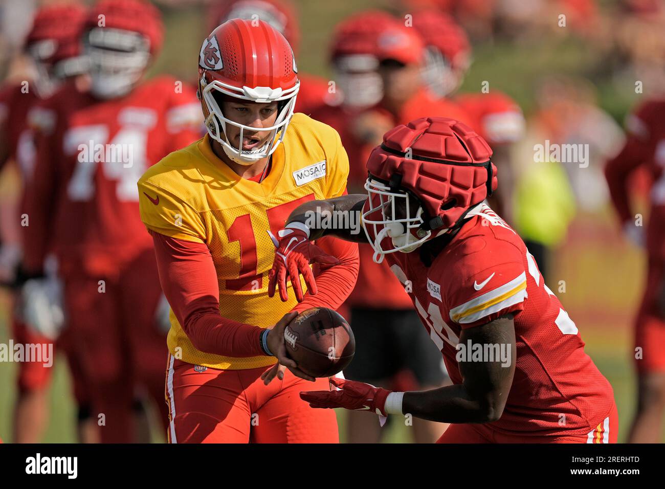 Kansas City Chiefs quarterback Patrick Mahomes (15) hands the ball to ...