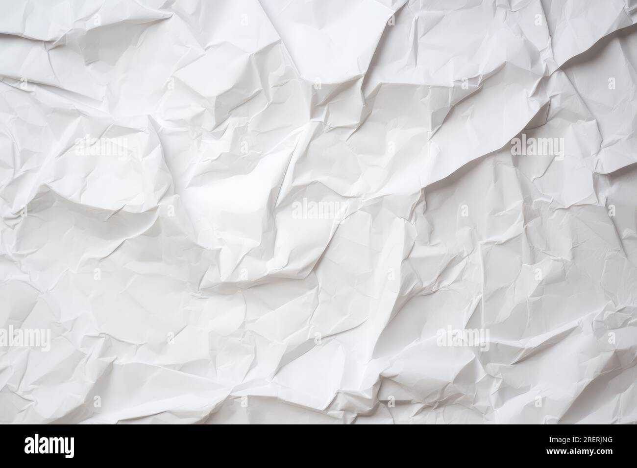Crumpled white paper shot up close Stock Photo - Alamy