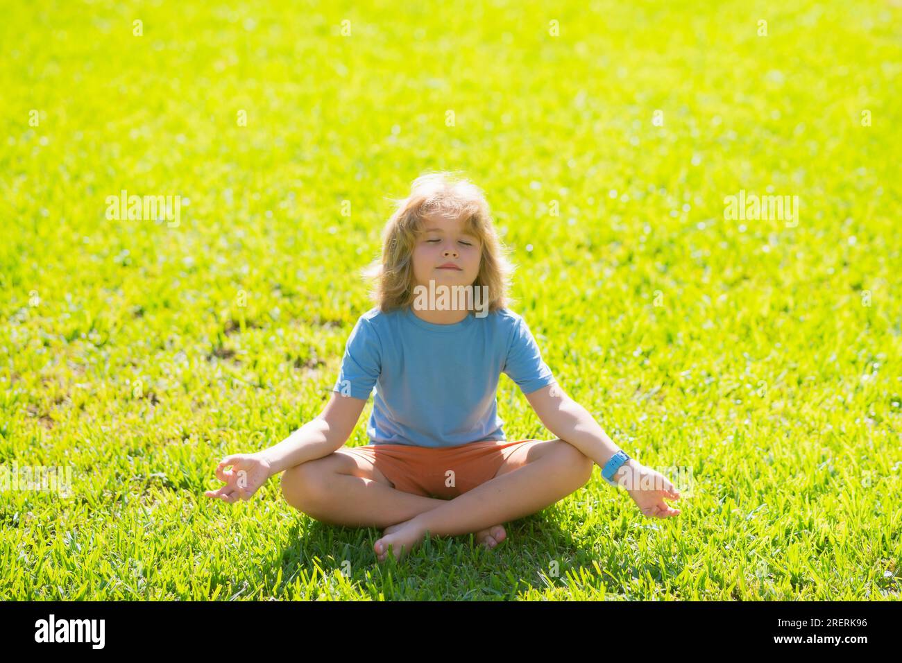 Child breathing fresh air. Child with close eye mindfulness meditating ...