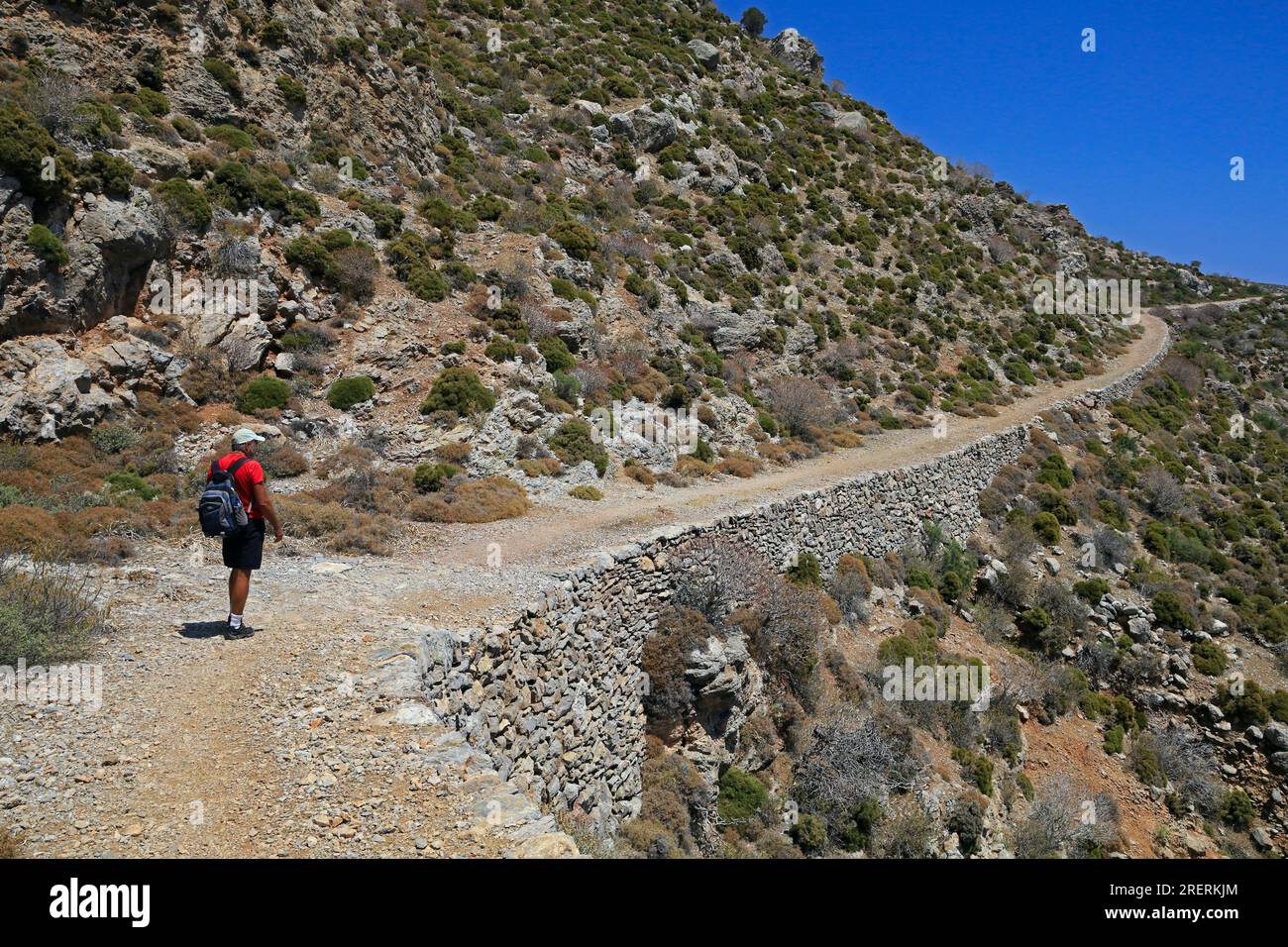 Solitary walker on the path from Livadia to Lethra beach along the ...