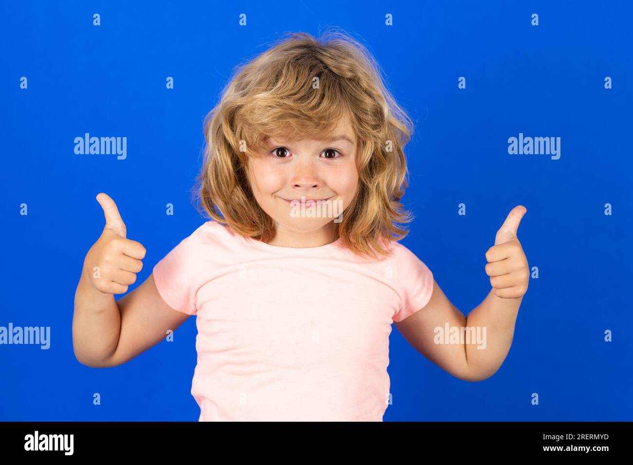 Portrait of funny smiling child, isolated studio background. Happy kid ...
