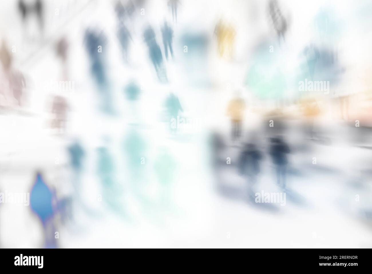 Blurred image of unrecognizable silhouettes of people walking in the ...