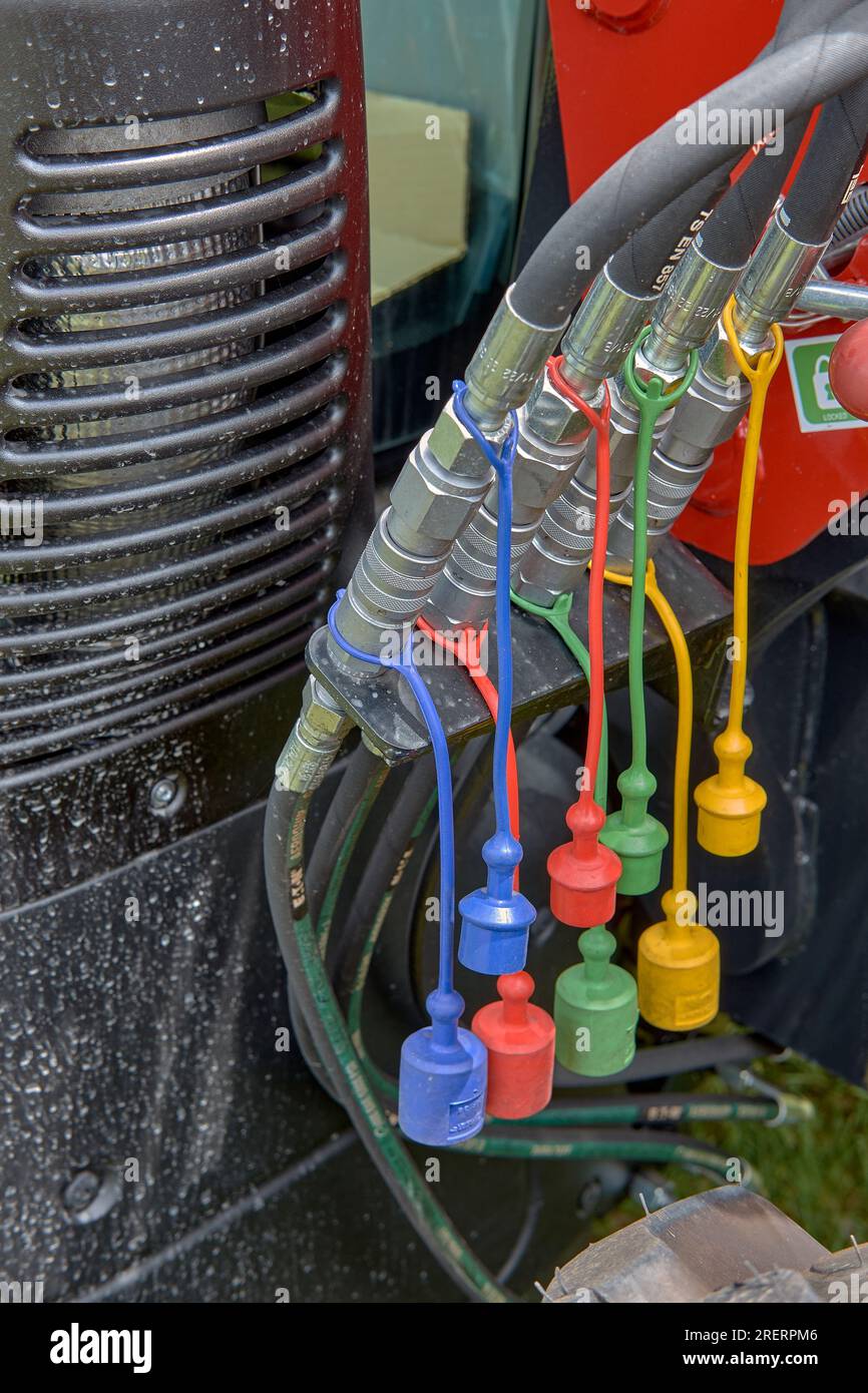 Hydraulic lines and connectors on a modern farm tractor Stock Photo - Alamy