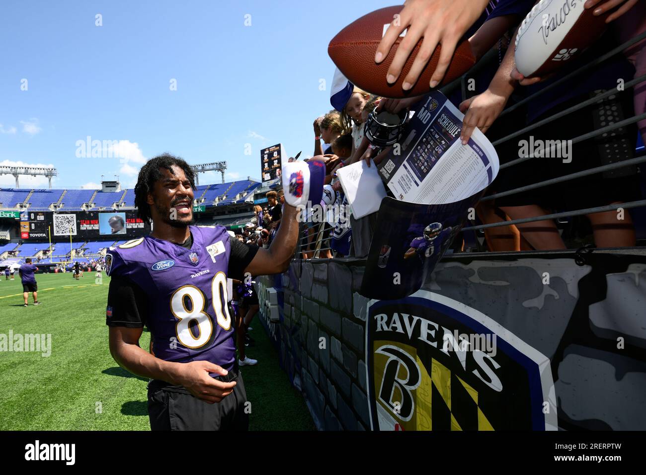 Baltimore Ravens tight end Isaiah Likely (80) greets fans after ...