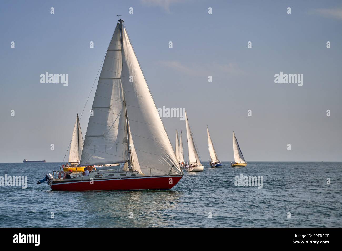 Sailing yacht regatta. Many sailing yachts in a row. sailing yachts ...