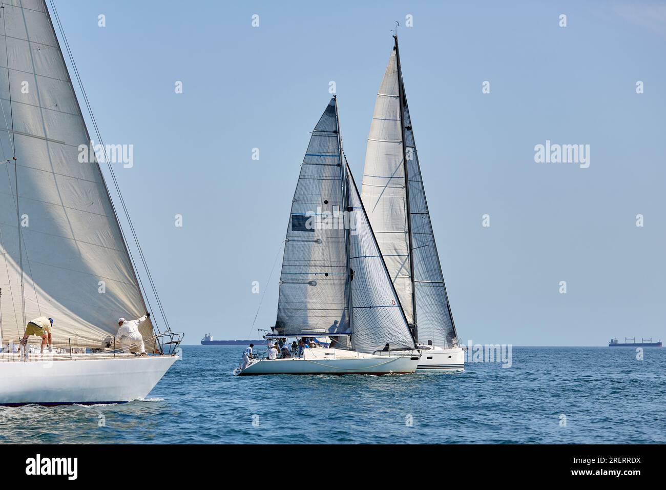 Sailing yacht regatta. Many sailing yachts in a row. sailing yachts ...