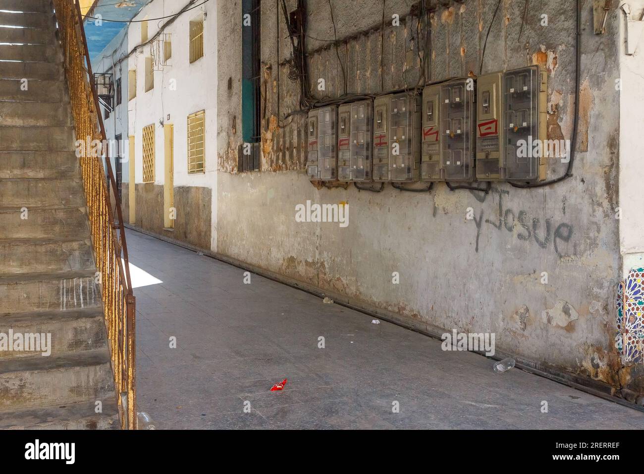 Havana, Cuba, Electric meters in a dirty weathered wall of an apartment ...