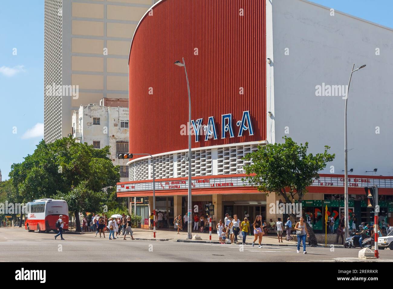 Havana, Cuba, Group of people walking by the Yara Cinema in the ...