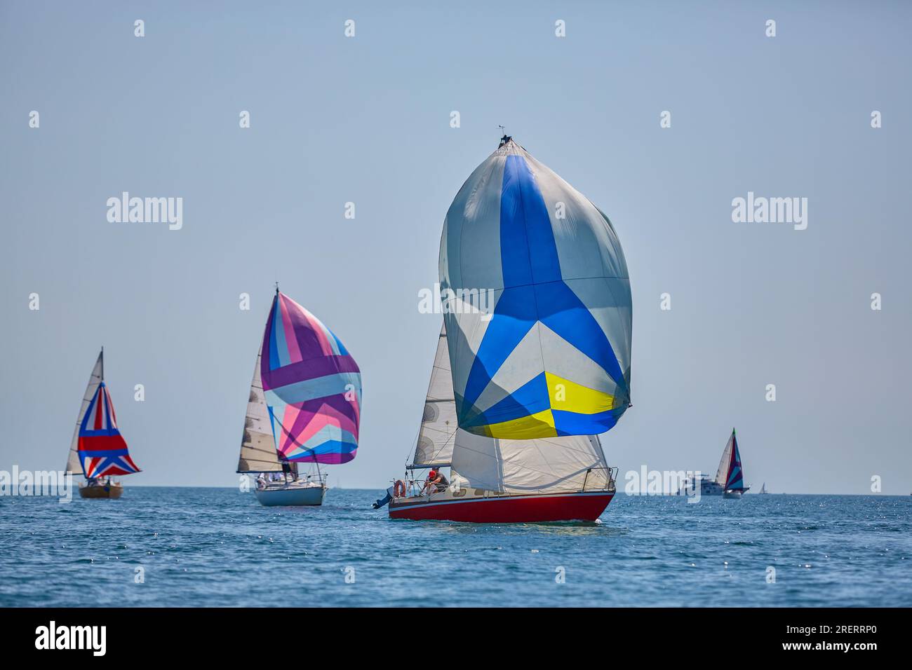 Sailing yacht regatta. Many sailing yachts in a row. sailing yachts ...