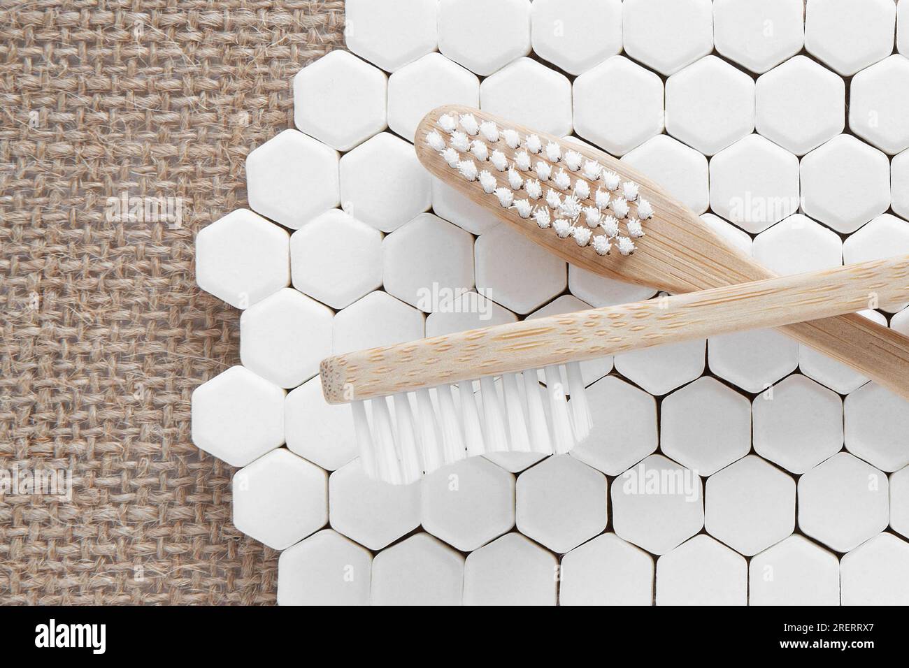 White solid toothpaste tablet with bamboo toothbrush Stock Photo - Alamy