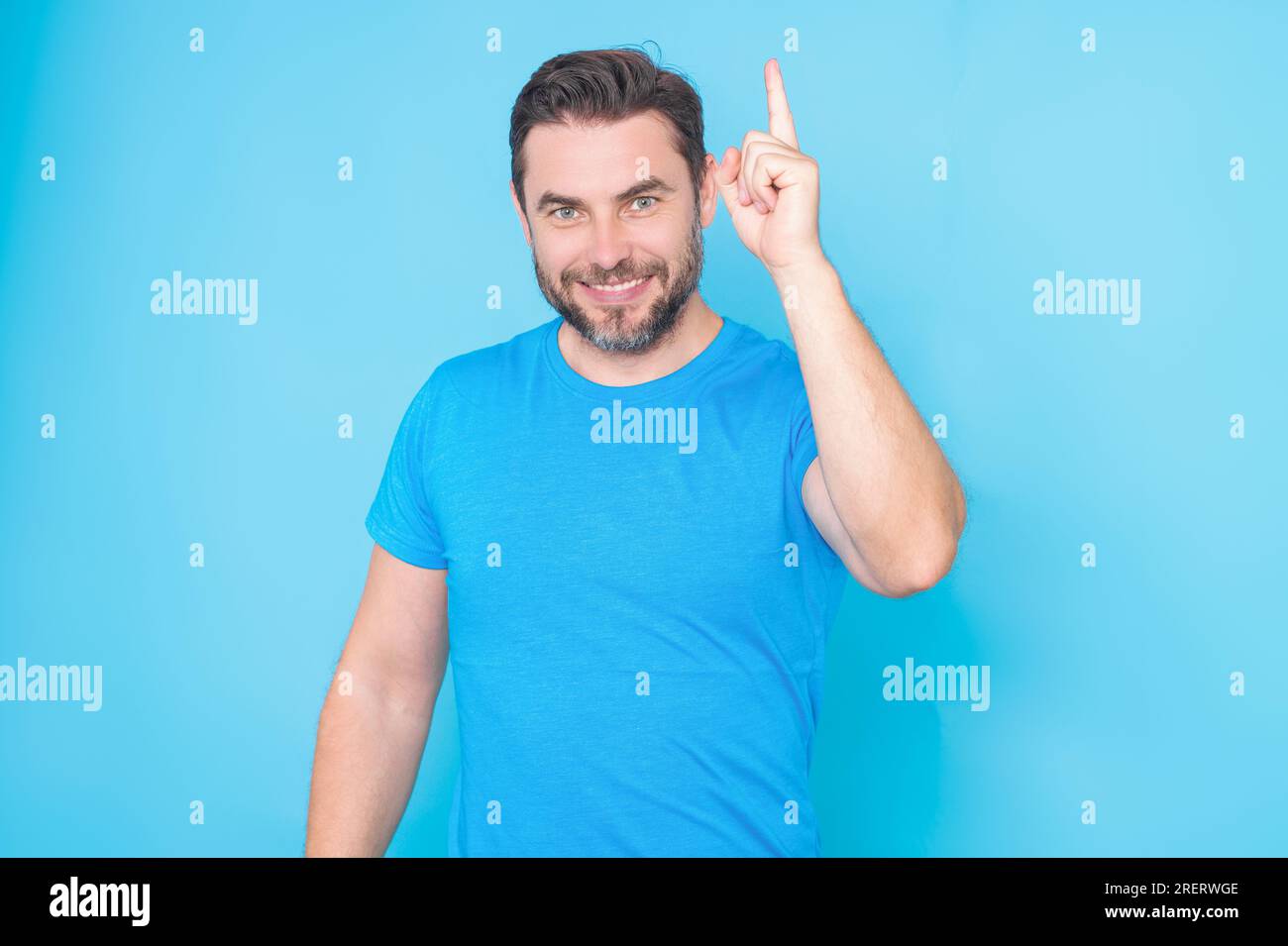 Happy man thinking of idea on studio background. Portrait of man has ...