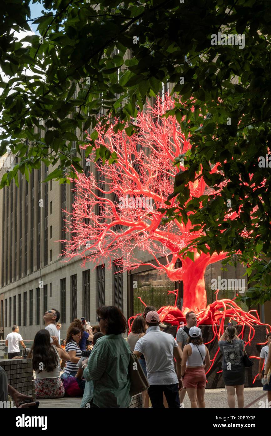 The old tree is a pink and red 25 foot tall sculpture comprised of man ...